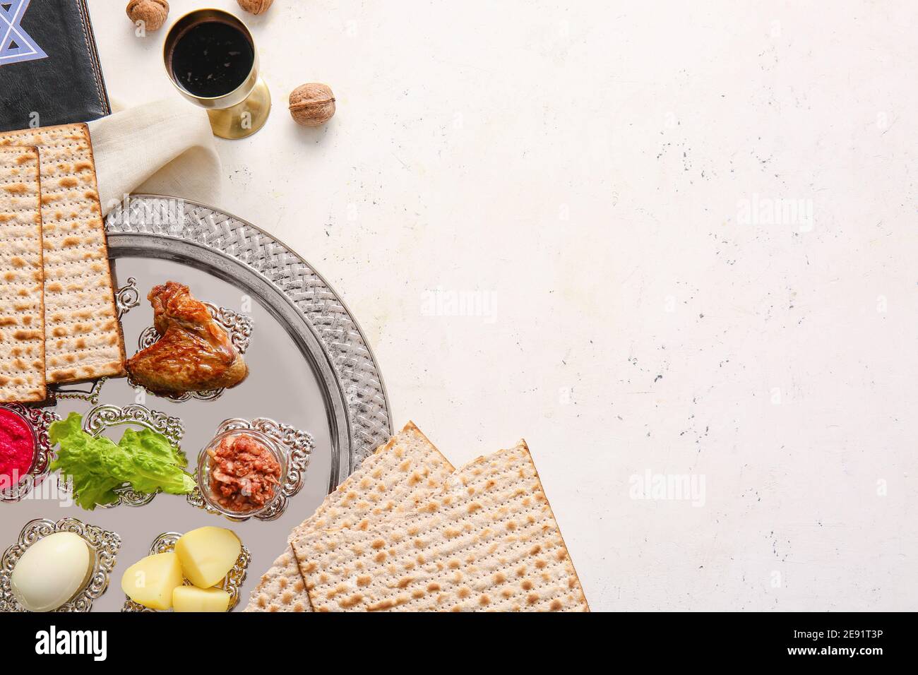 Passover Seder plate with traditional food on white background Stock ...