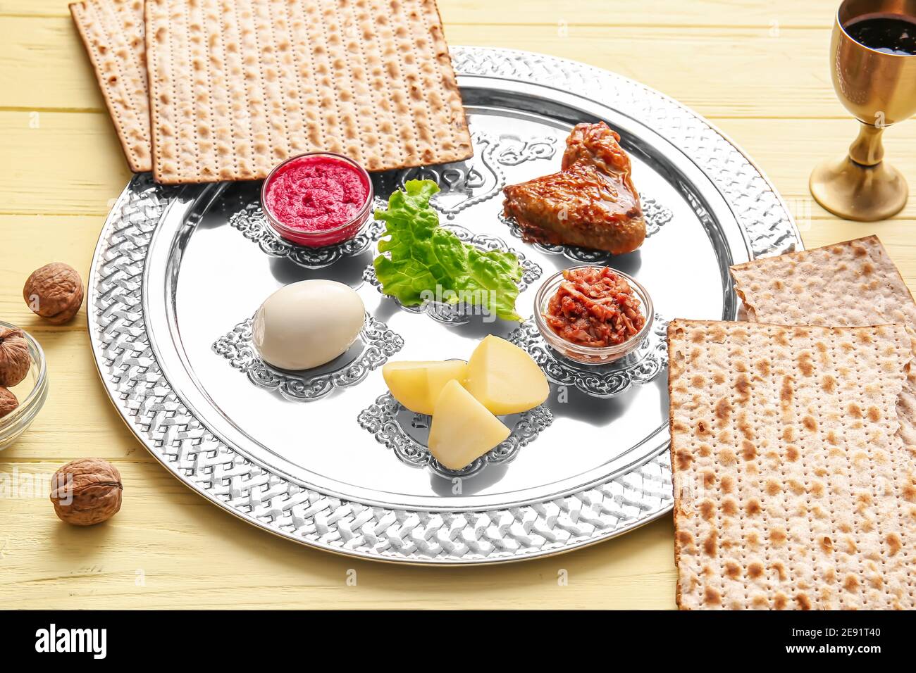 Passover Seder plate with traditional food on table Stock Photo - Alamy