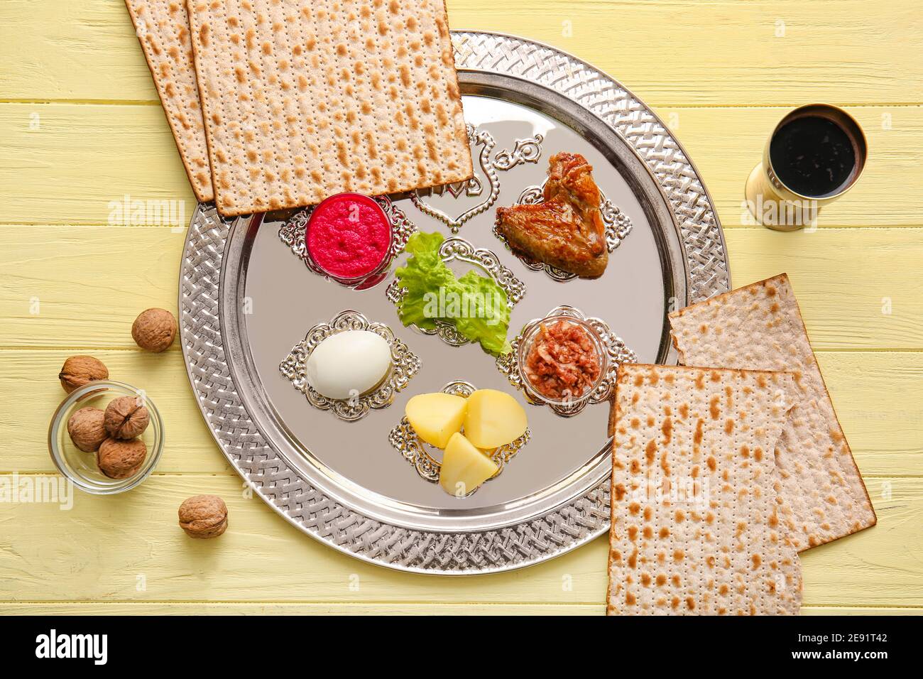 Passover Seder plate with traditional food on table Stock Photo - Alamy