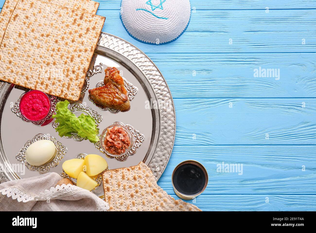 Passover Seder plate with traditional food on table Stock Photo - Alamy