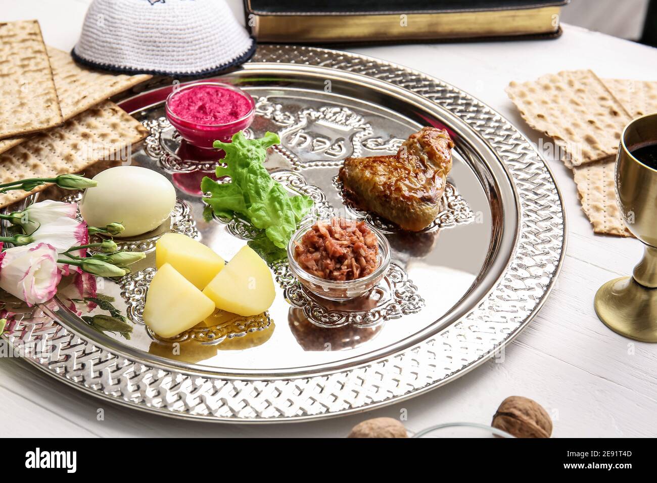 Passover Seder plate with traditional food on table Stock Photo - Alamy