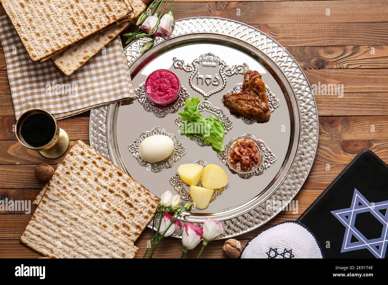 Passover Seder plate with traditional food on table Stock Photo - Alamy