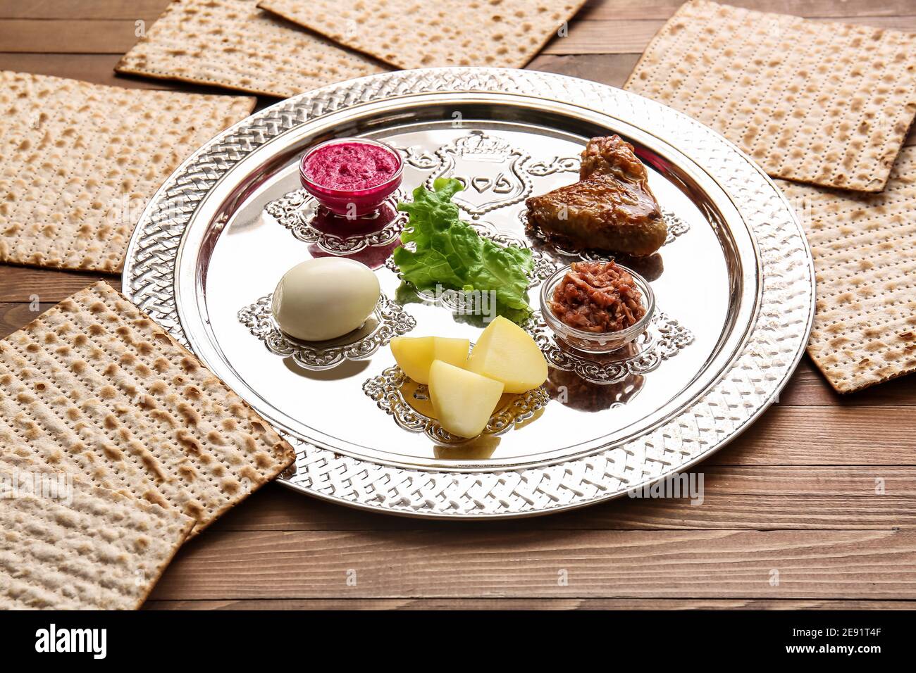 Passover Seder plate with traditional food on table Stock Photo - Alamy
