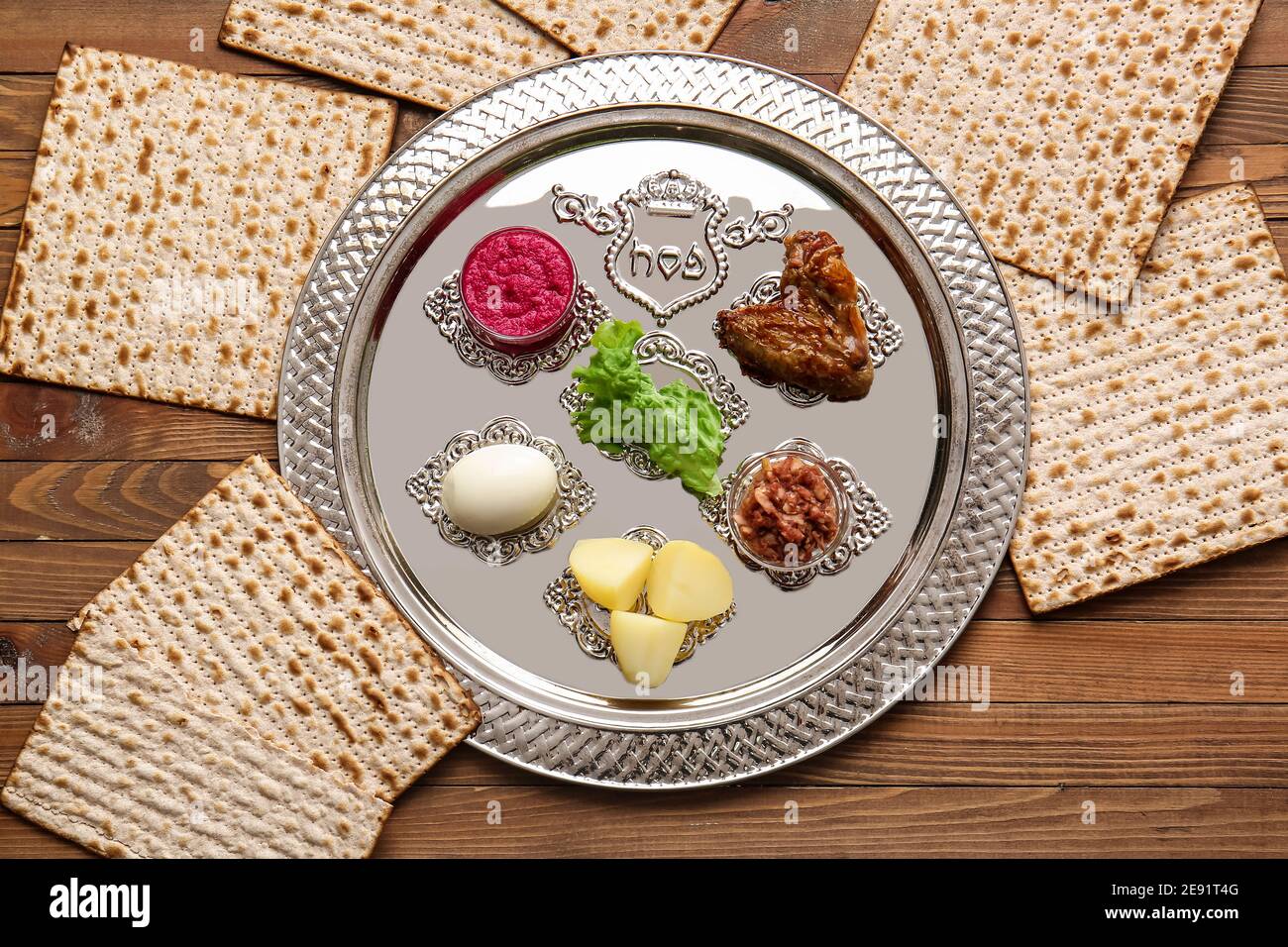 Passover Seder plate with traditional food on table Stock Photo - Alamy