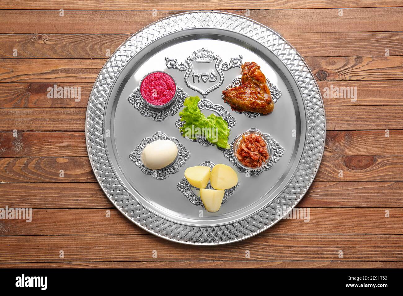 Passover Seder plate with traditional food on table Stock Photo - Alamy