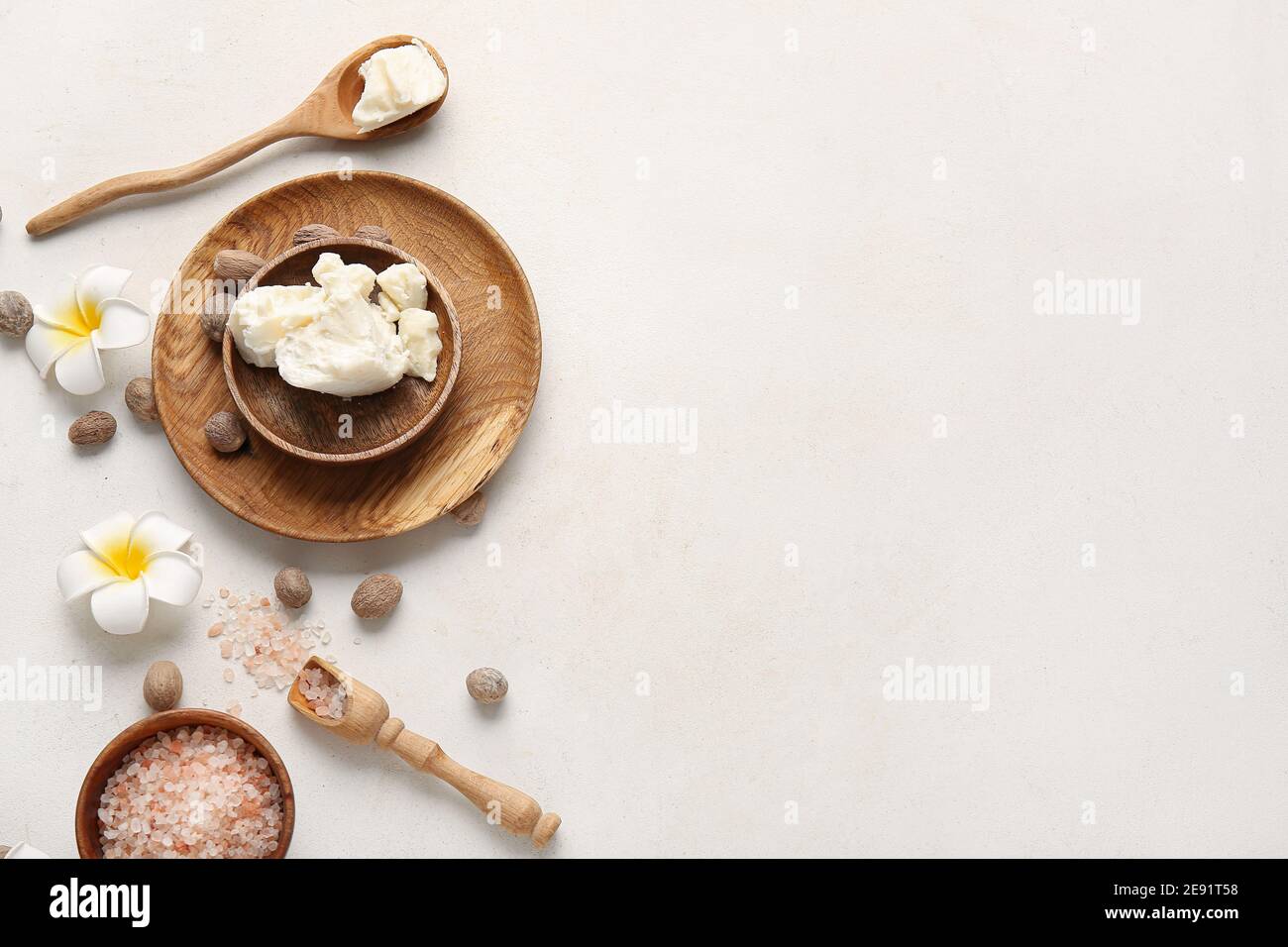 Shea butter with sea salt on light background Stock Photo - Alamy