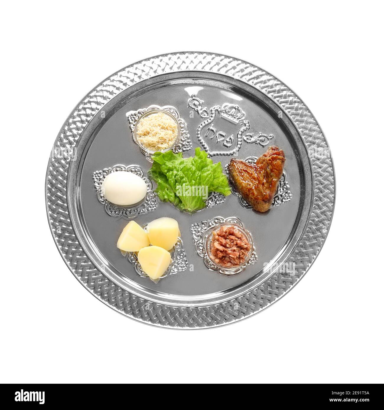 Passover Seder plate with traditional food on white background Stock ...
