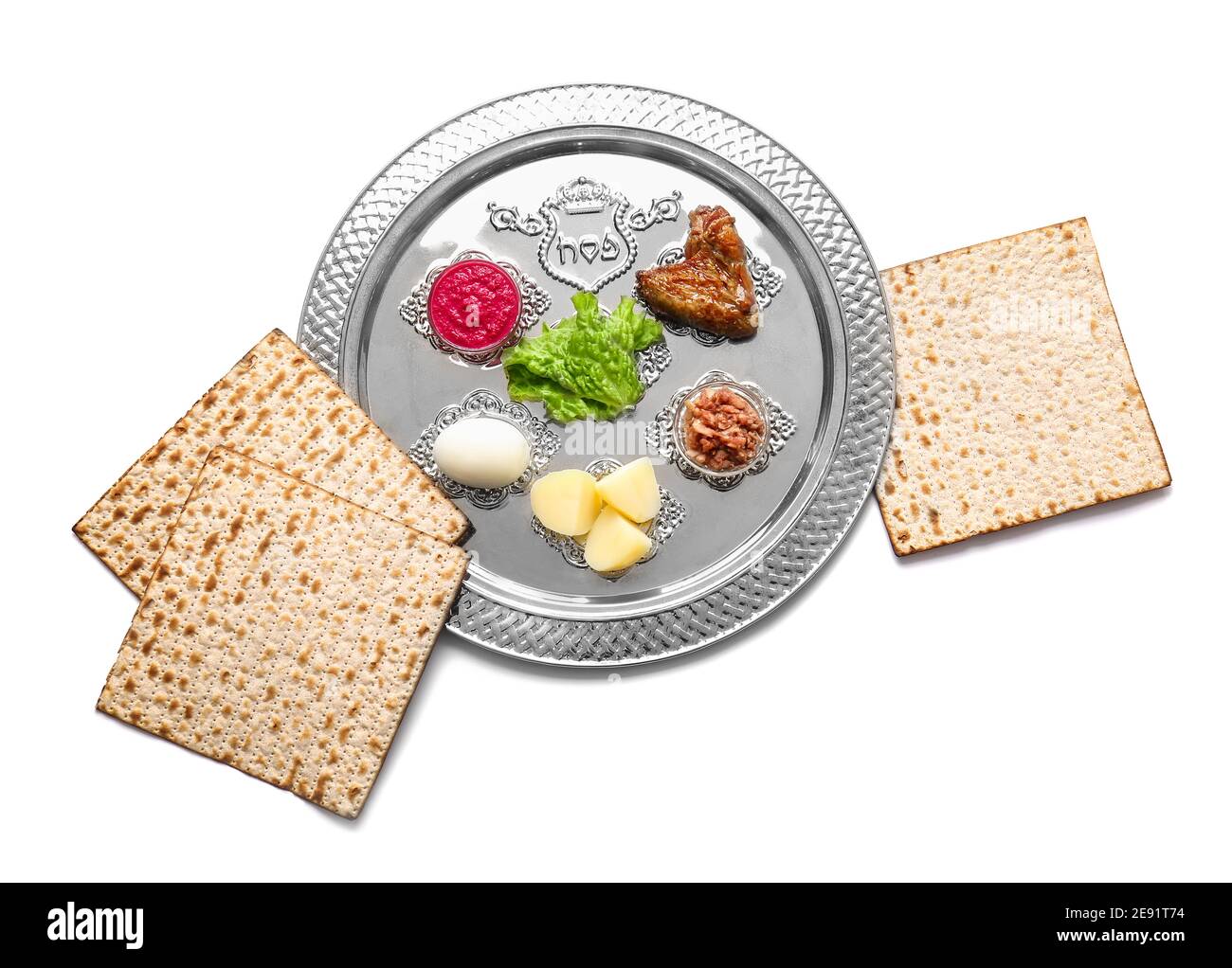 Passover Seder plate with traditional food on white background Stock ...