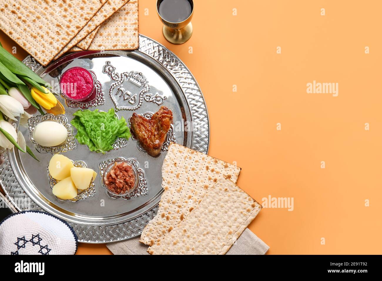 Passover Seder plate with traditional food on color background Stock ...