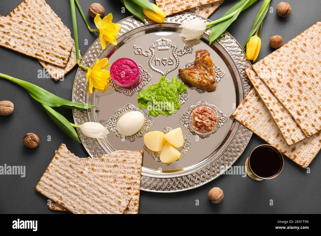 Passover Seder plate with traditional food on dark background Stock ...