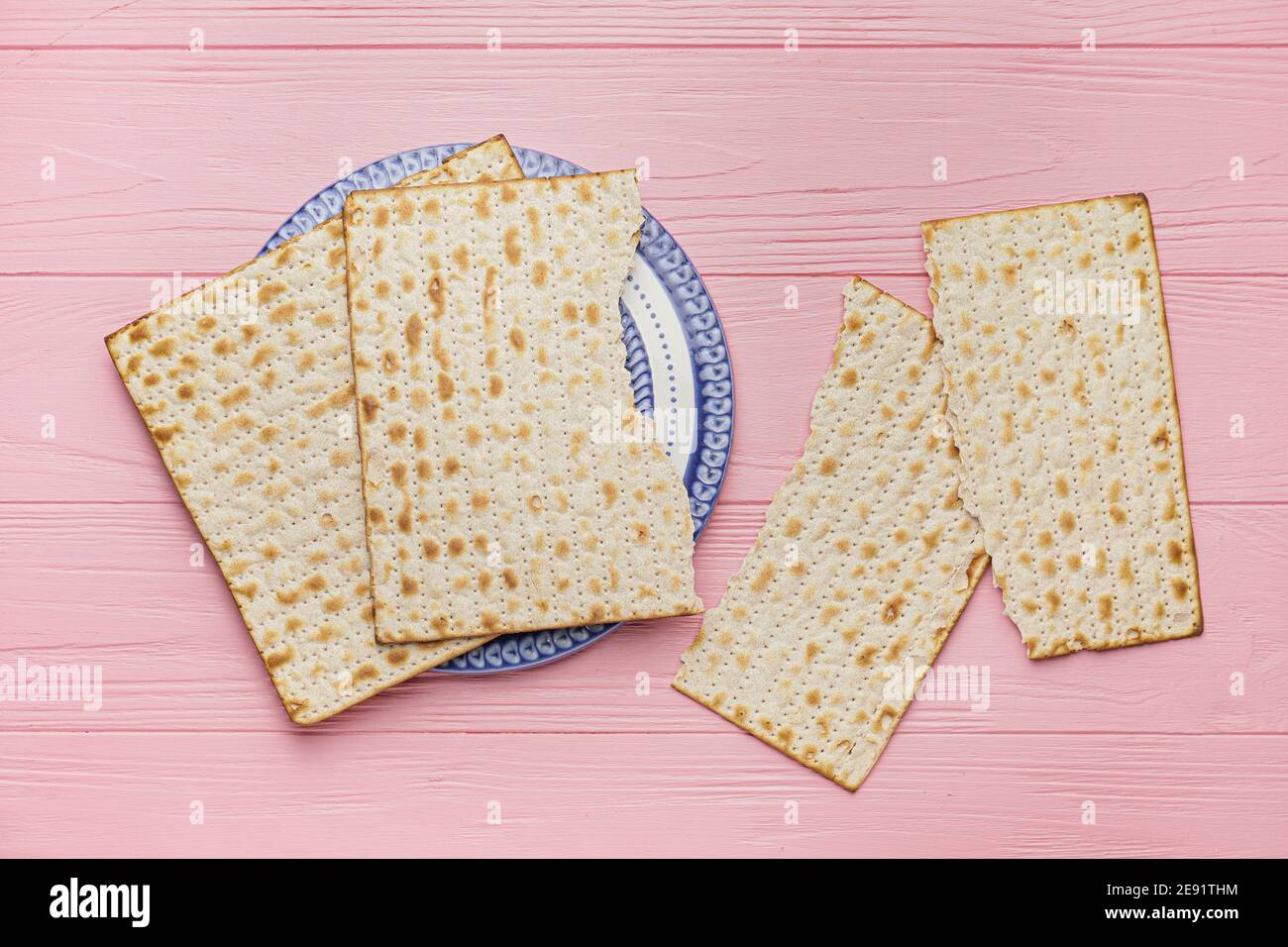 Jewish flatbread matza for Passover on wooden background Stock Photo ...