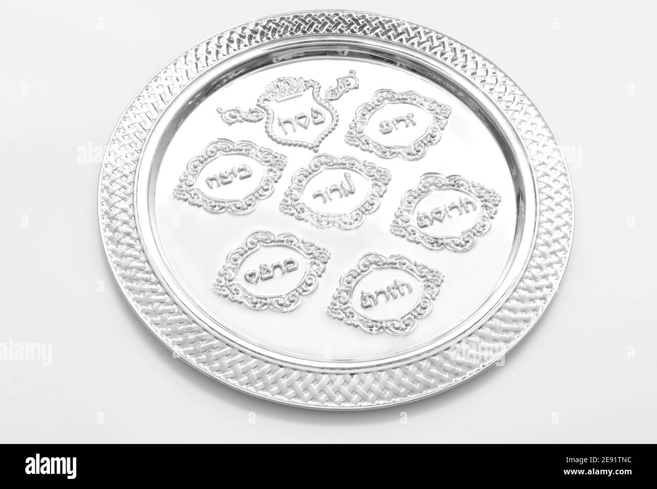 Passover Seder plate on white background Stock Photo - Alamy
