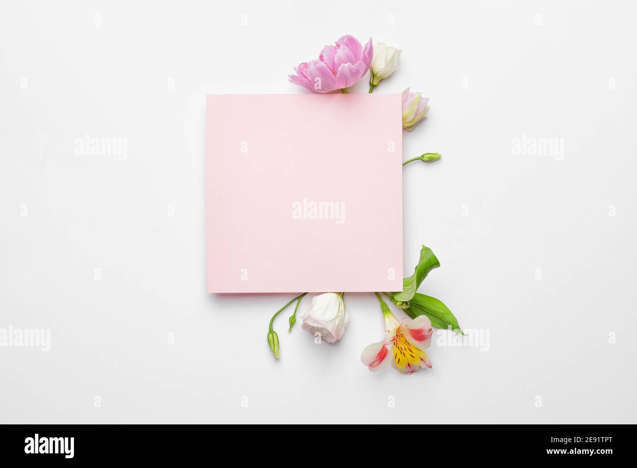 Empty card with beautiful flowers on white background Stock Photo - Alamy