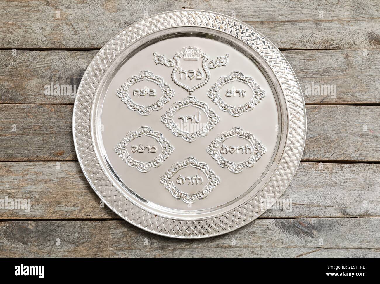 Passover Seder plate on wooden background Stock Photo - Alamy