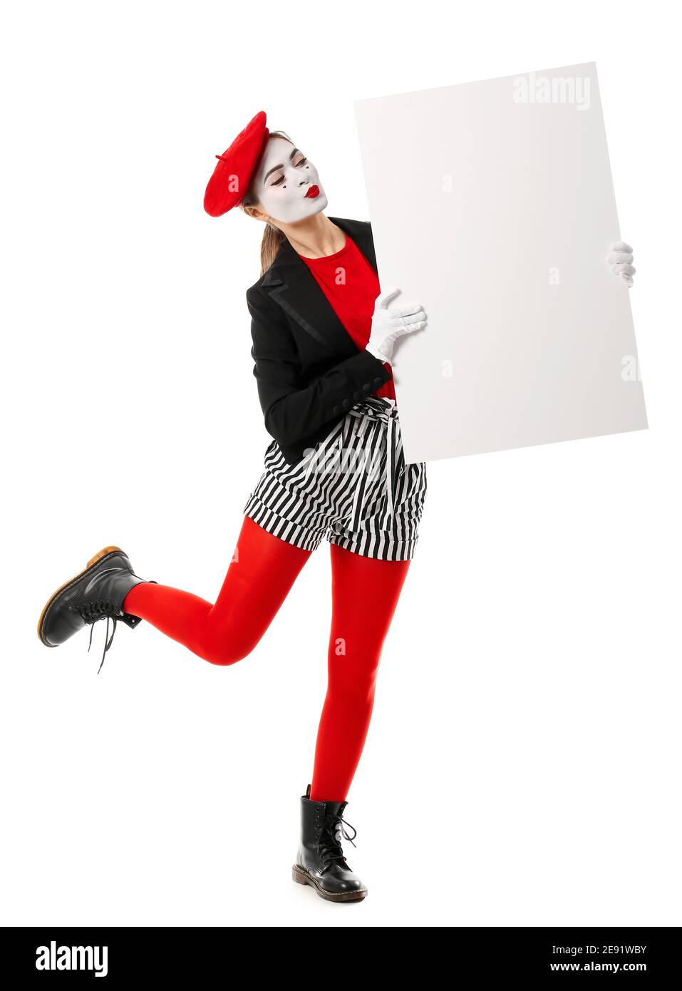 Female pantomimist with blank poster on white background Stock Photo ...