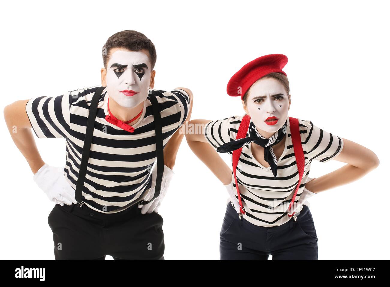Male and female pantomimists on white background Stock Photo - Alamy