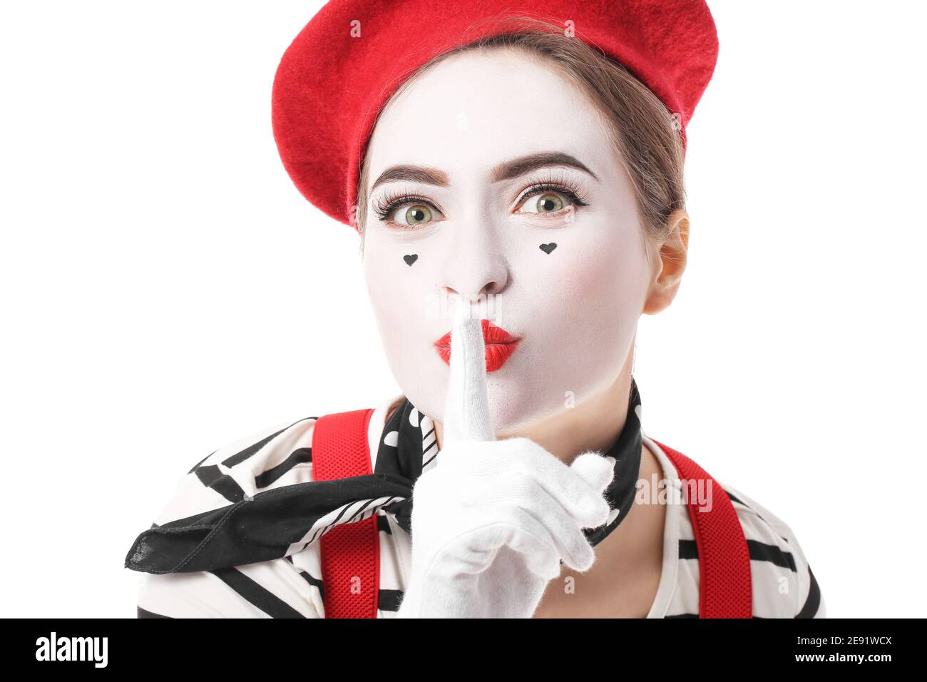 Female pantomimist showing silence gesture on white background Stock ...