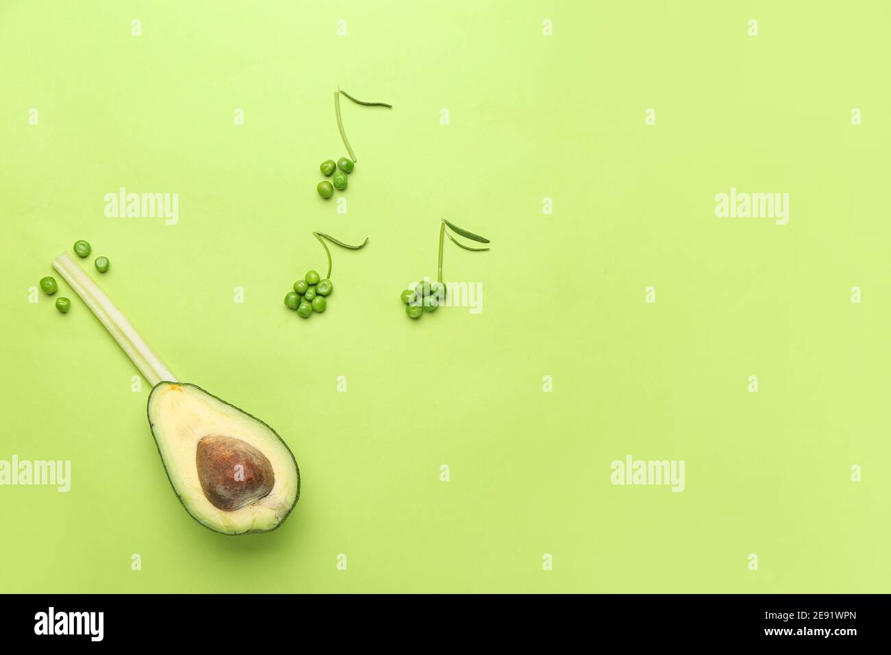 Guitar and music notes made of vegetables on color background Stock ...