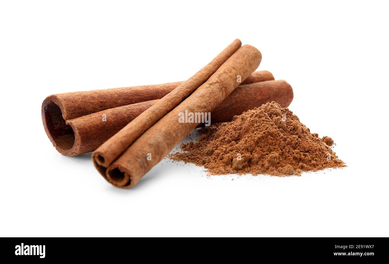 Cinnamon sticks and powder on white background Stock Photo - Alamy