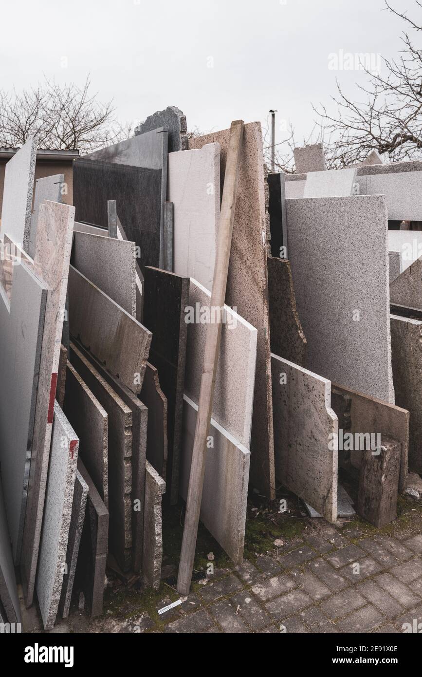 in the courtyard of a stonemason's workshop there are many different ...
