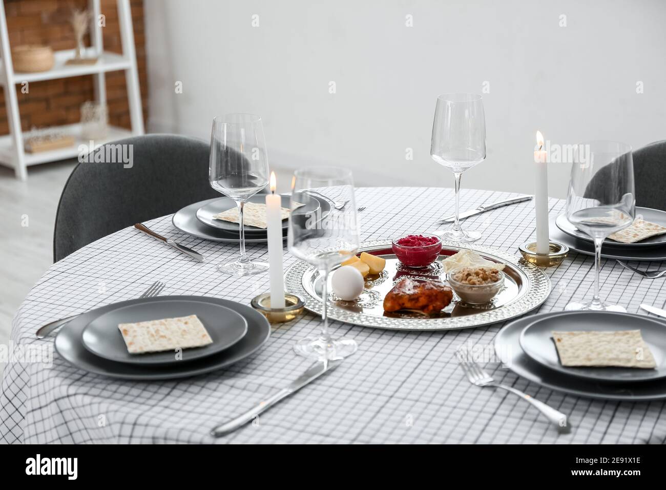 Passover Seder plate with traditional food on served table Stock Photo ...