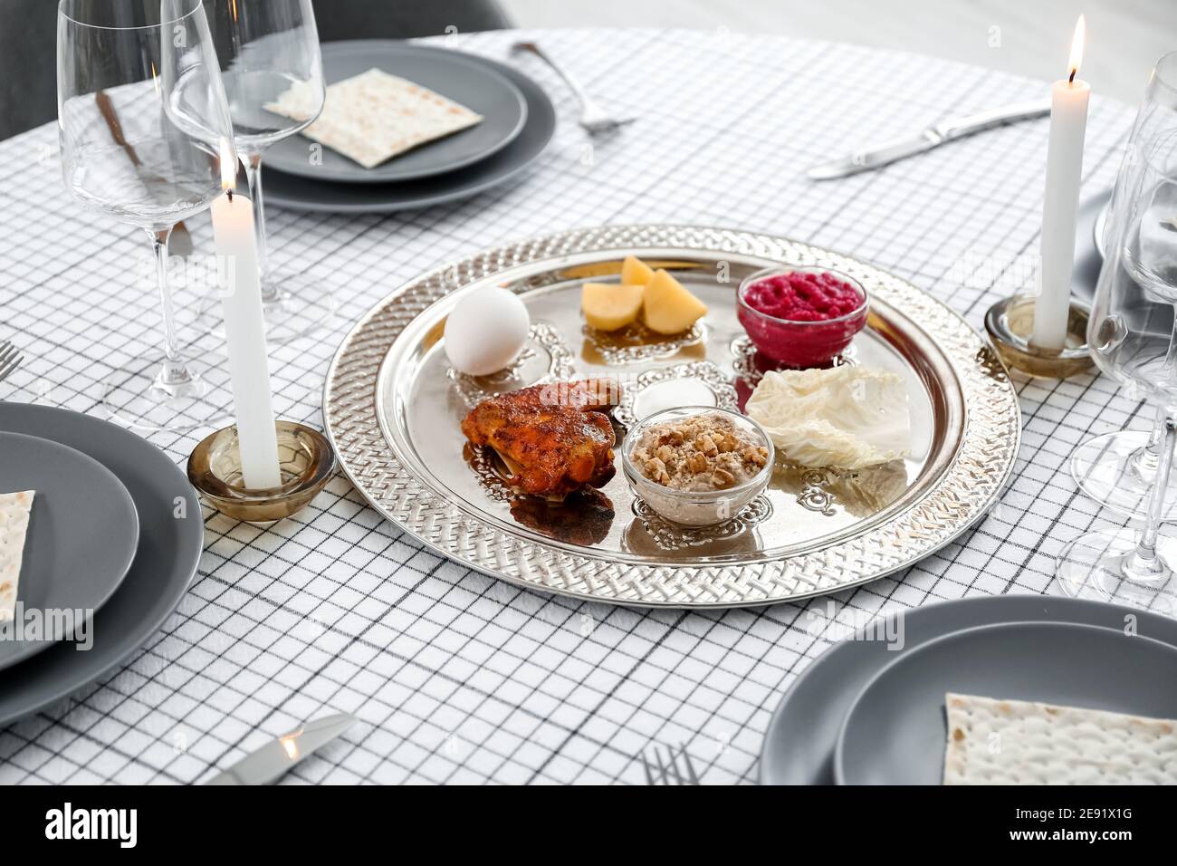 Passover Seder plate with traditional food on served table Stock Photo ...