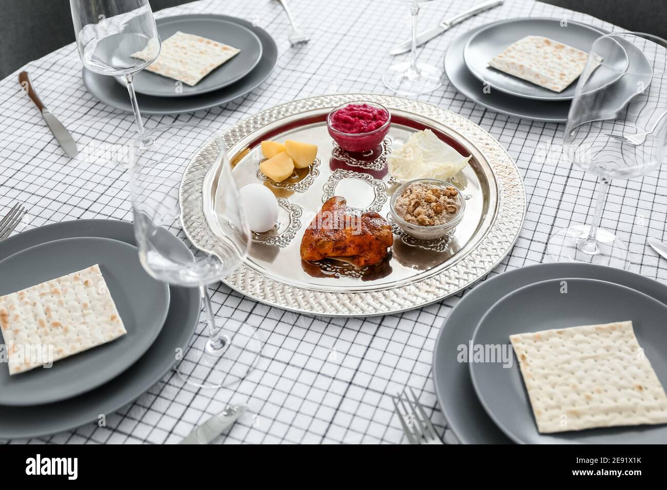 Passover Seder plate with traditional food on served table Stock Photo ...