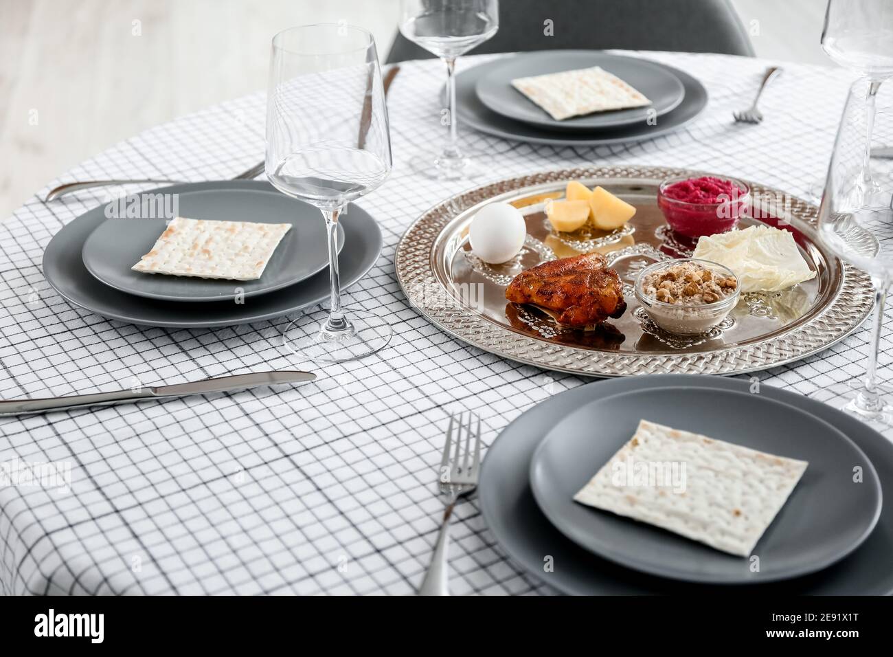 Passover Seder plate with traditional food on served table Stock Photo ...