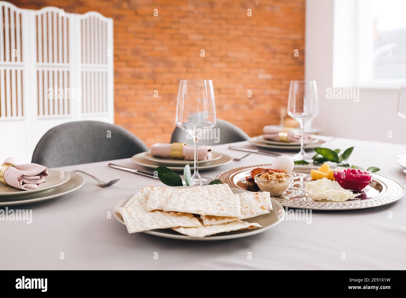 Passover Seder plate with traditional food on served table Stock Photo ...