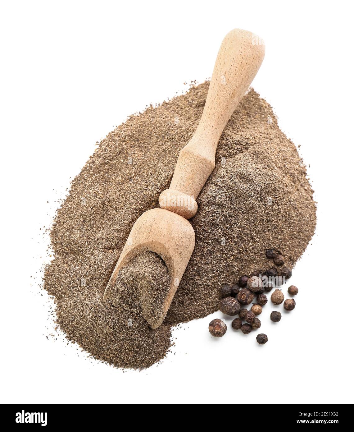 Black pepper powder and scoop on white background Stock Photo - Alamy