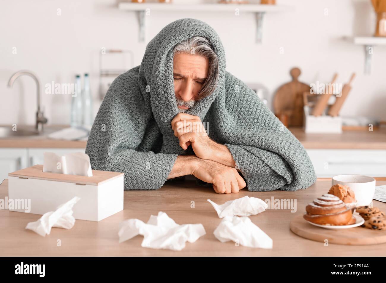 Sick old man coughing sitting hi-res stock photography and images - Alamy