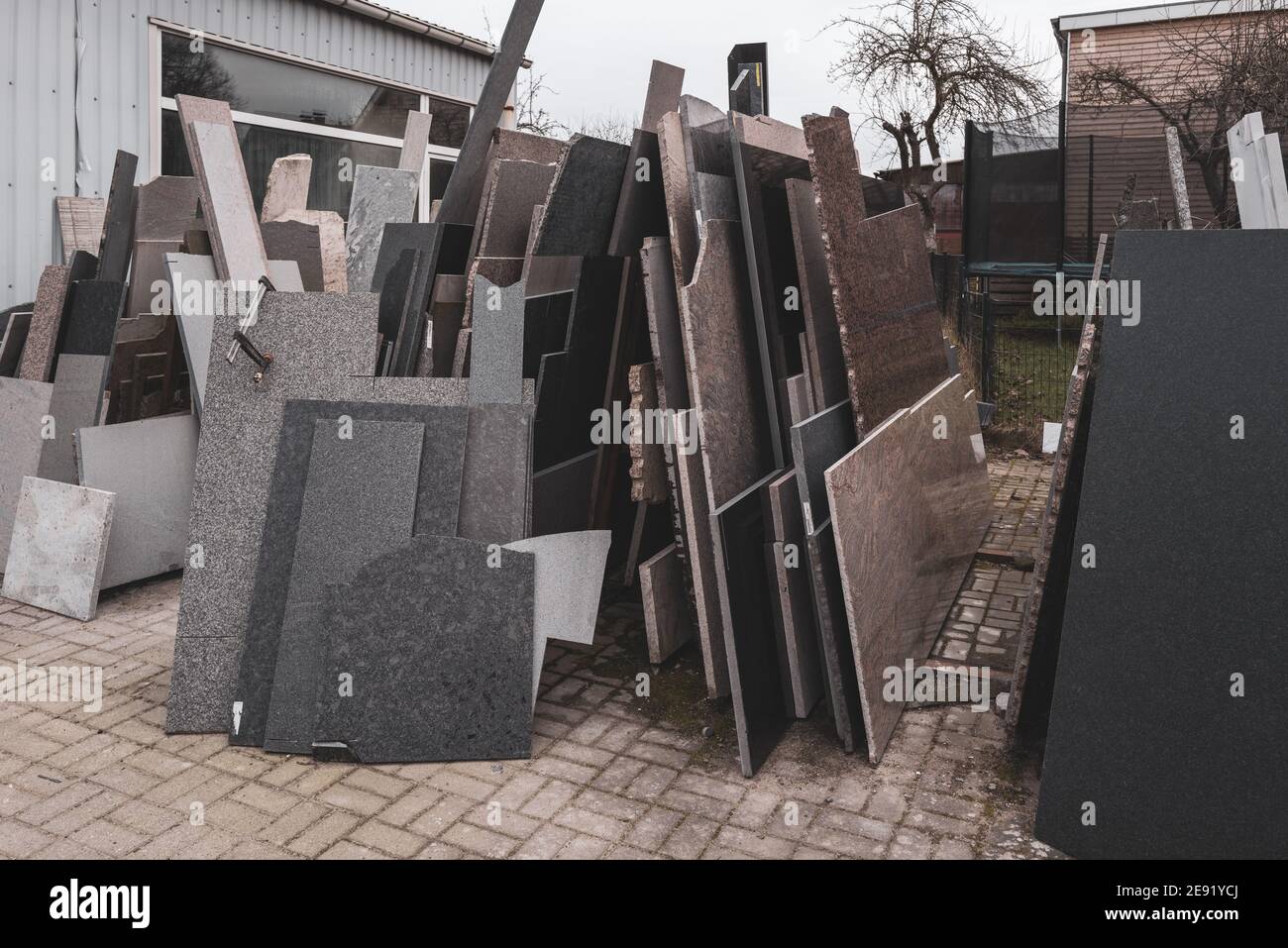 in the courtyard of a stonemason's workshop there are many different ...