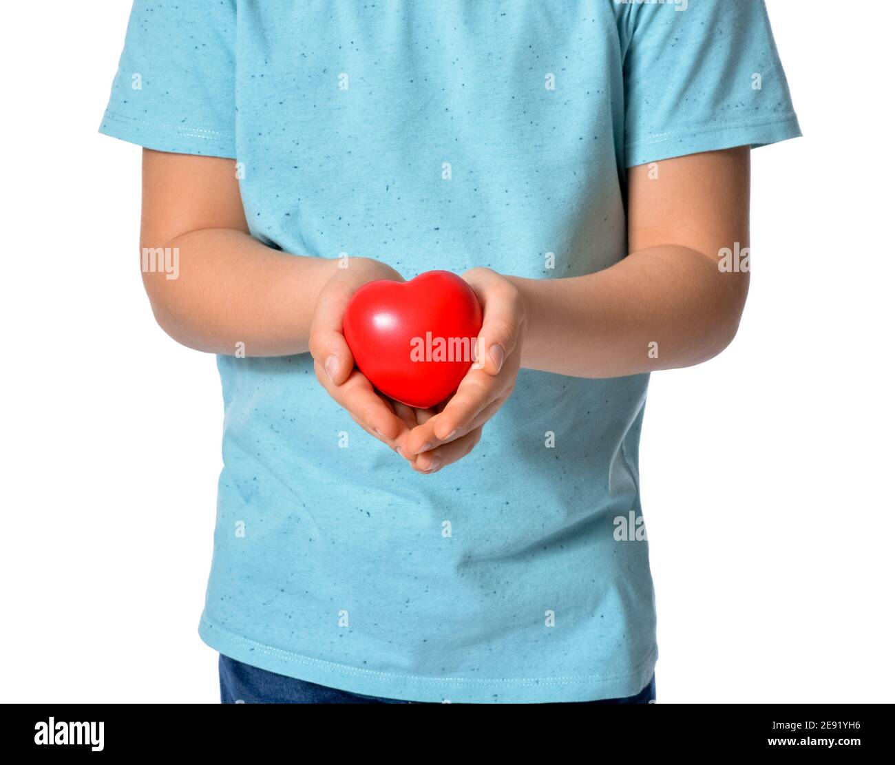 Cute little boy with red heart on white background Stock Photo - Alamy