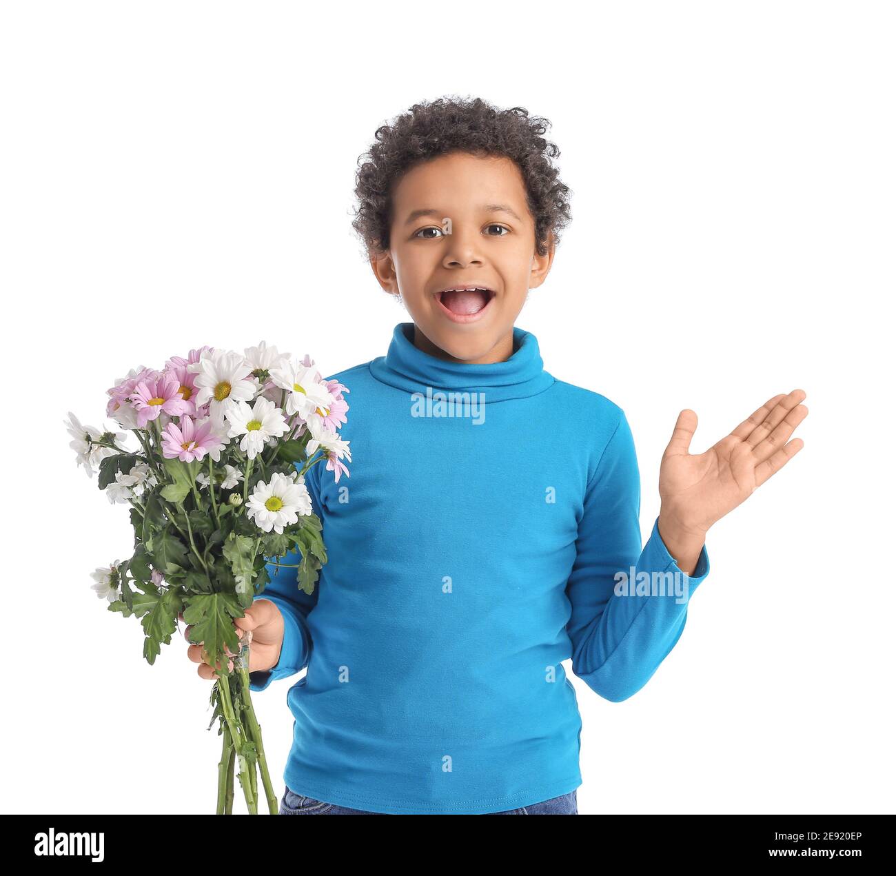 African-American boy with bouquet of beautiful flowers on white ...