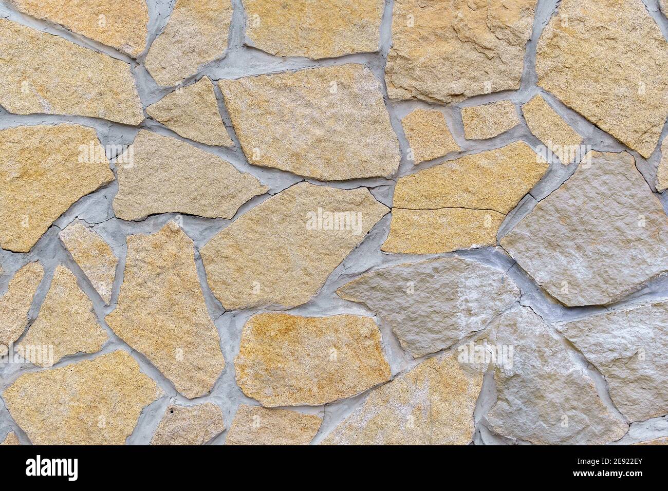shaped stone wall creation, in various shades of brown. wallpaper ...