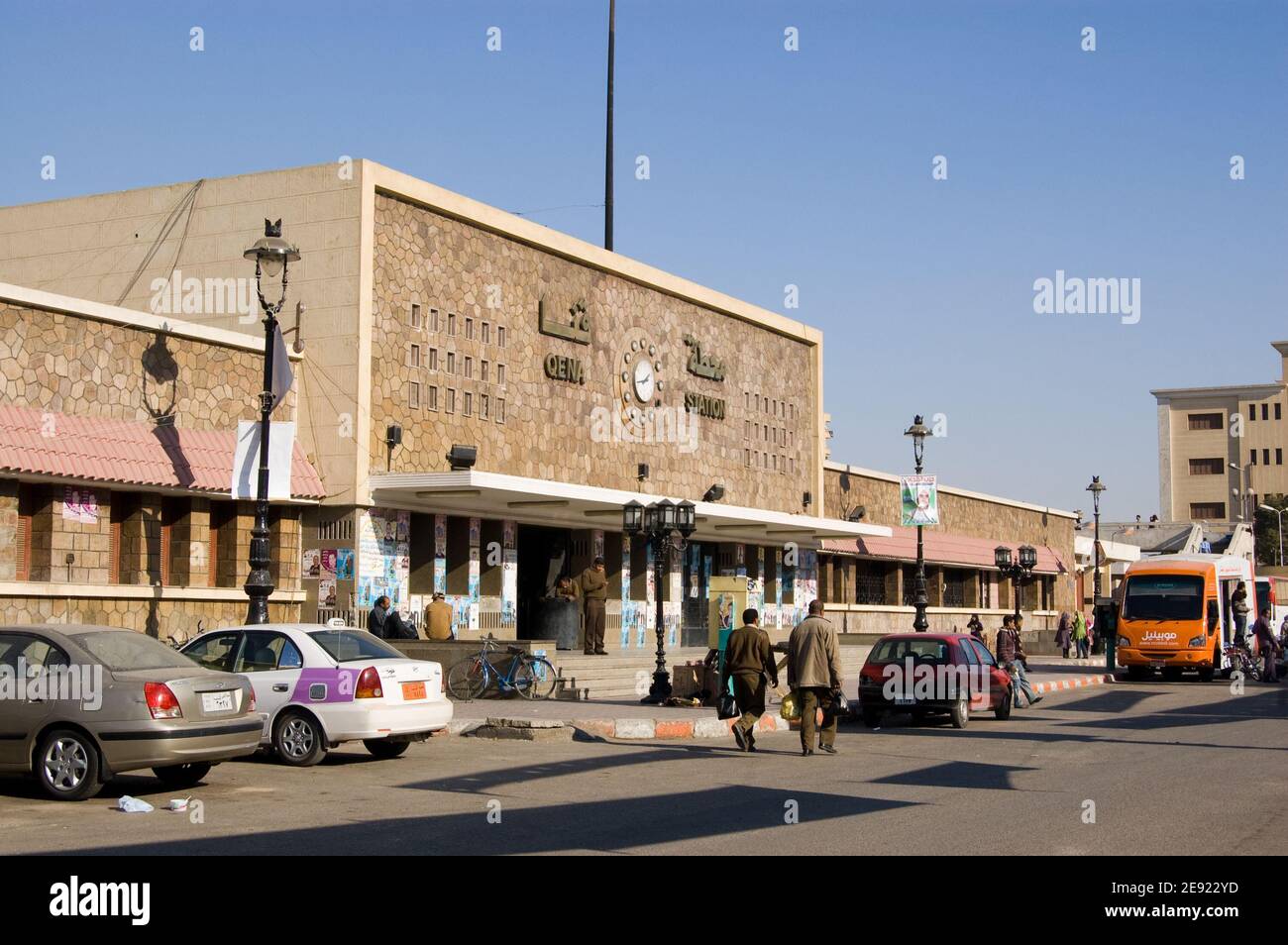 QENA, EGYPT - JANUARY 4: Commuters and security personnel at the ... QENA, EGYPT - JANUARY 4: Commuters and security personnel at the ...