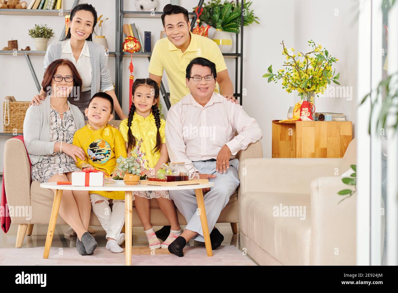 Gathered at home to celebrate event Stock Photo - Alamy