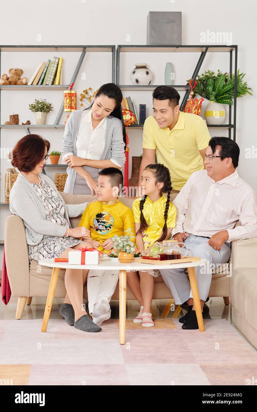 Family celebrating holiday Stock Photo - Alamy