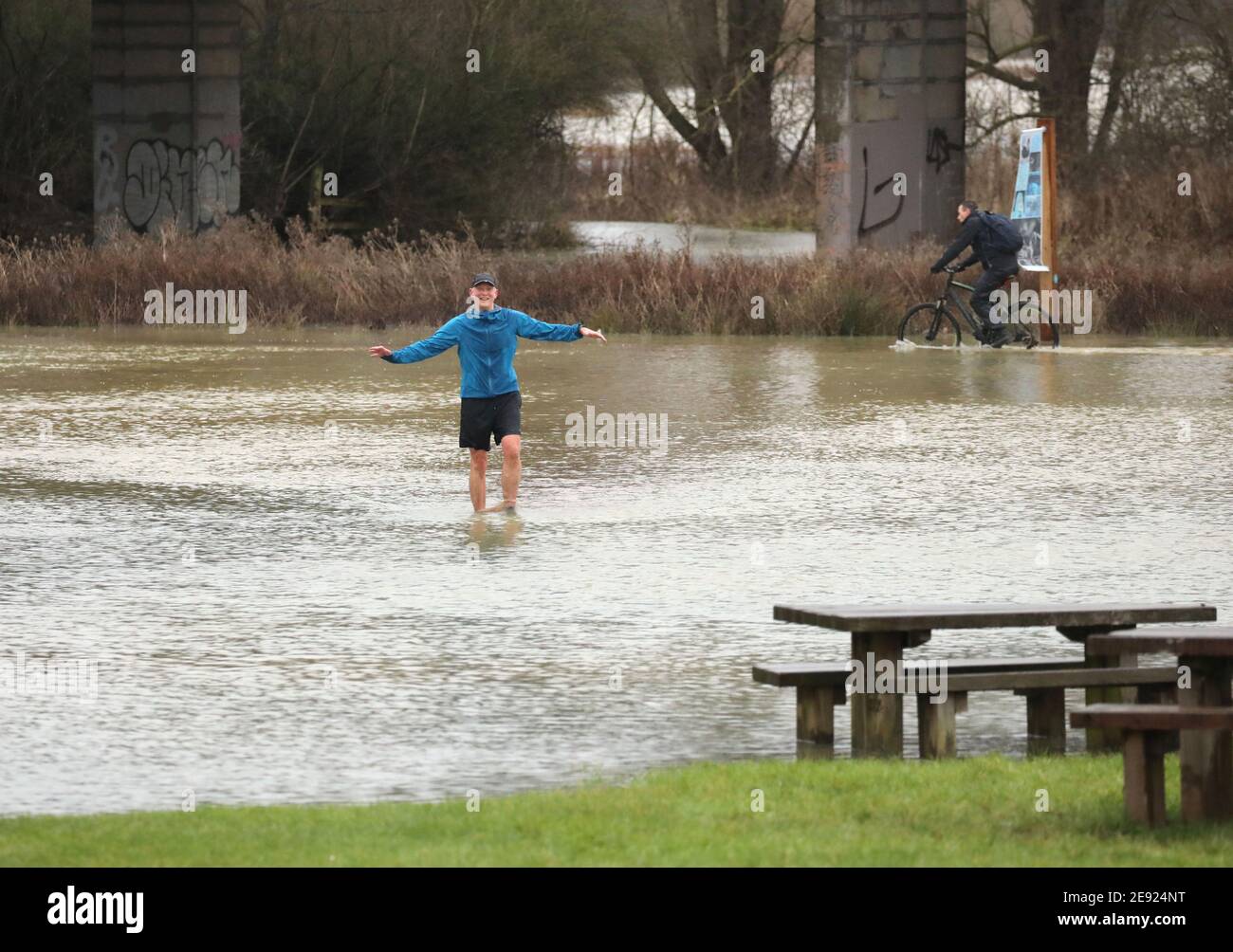 Runner in floodwater hi-res stock photography and images - Alamy