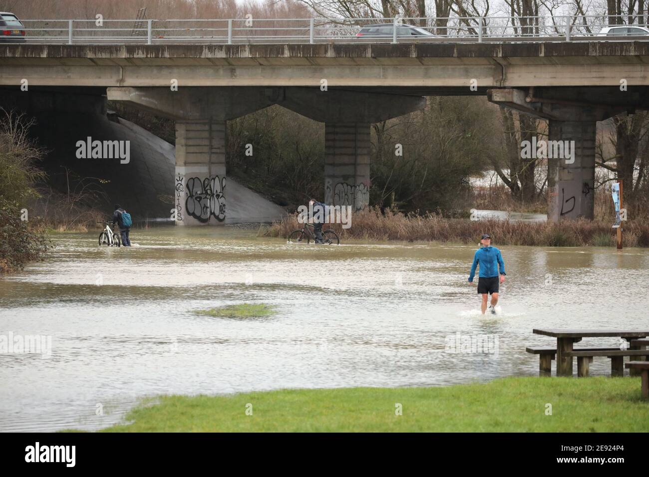 Peterborough, UK. 30th Jan, 2021. People battle through flooding in ...
