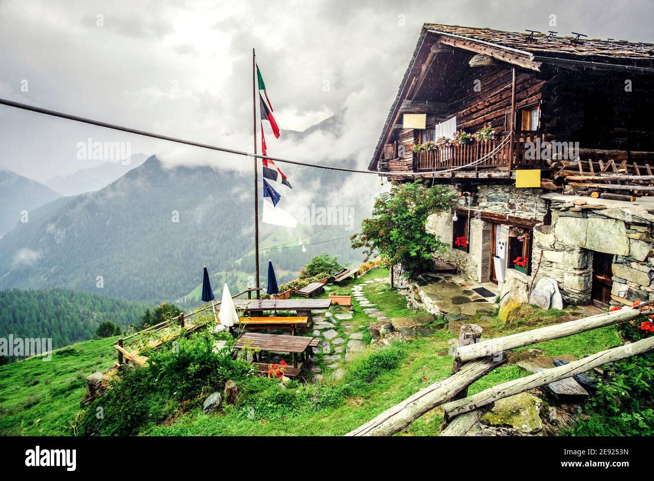 Rest house high in alpine mountains Stock Photo - Alamy