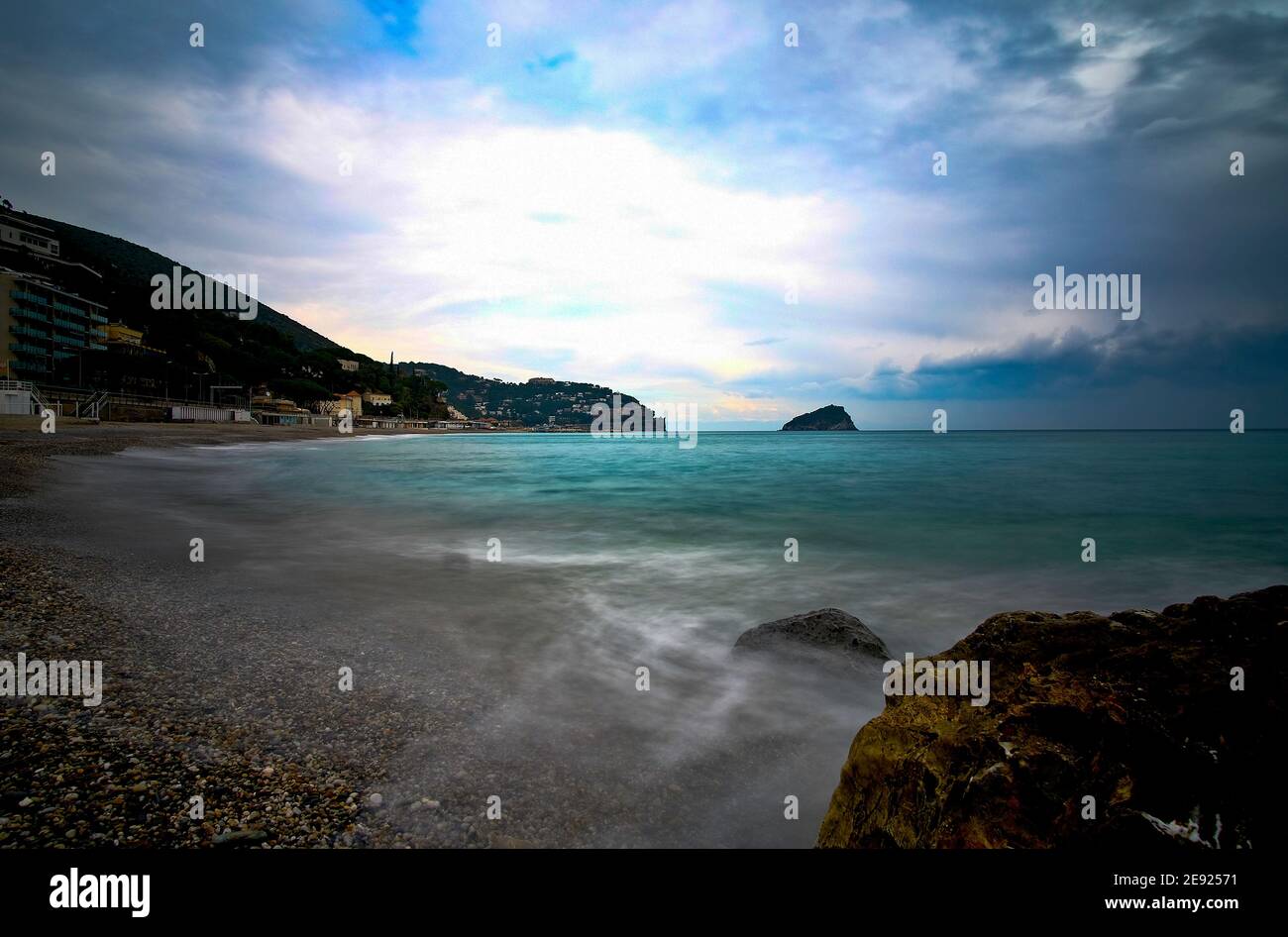 beautiful sandy and pebble beaches and an island in the background. sea ...