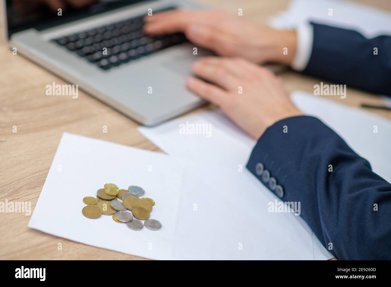 Small amount of money coins on table Stock Photo - Alamy