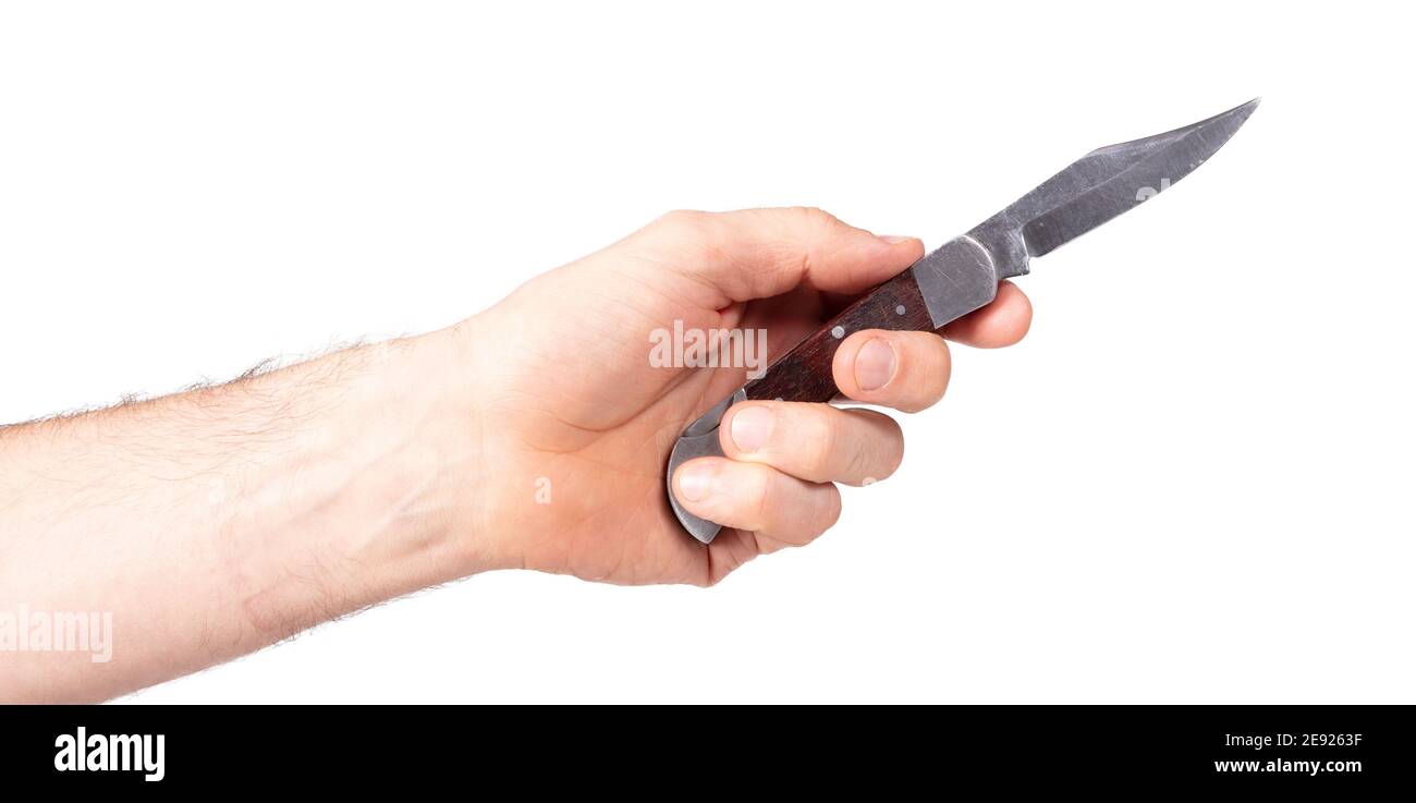 Old sharp metal pocket knife in hand, isolated Stock Photo - Alamy