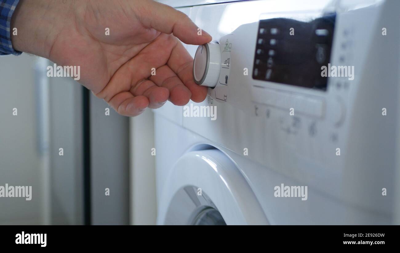 Laundromat start working hi-res stock photography and images - Alamy