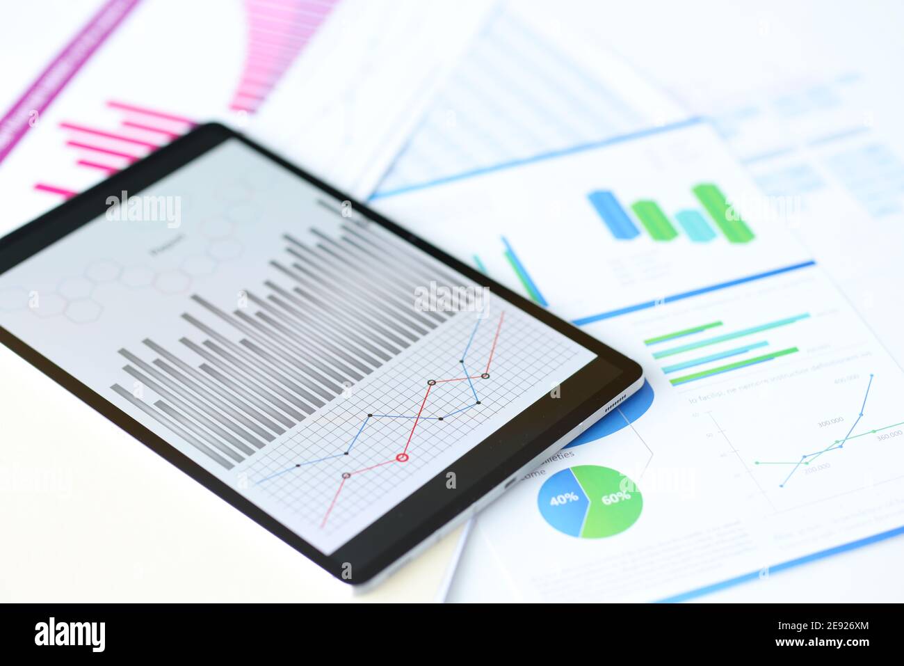 Closeup tablet graphs in hi-res stock photography and images - Alamy
