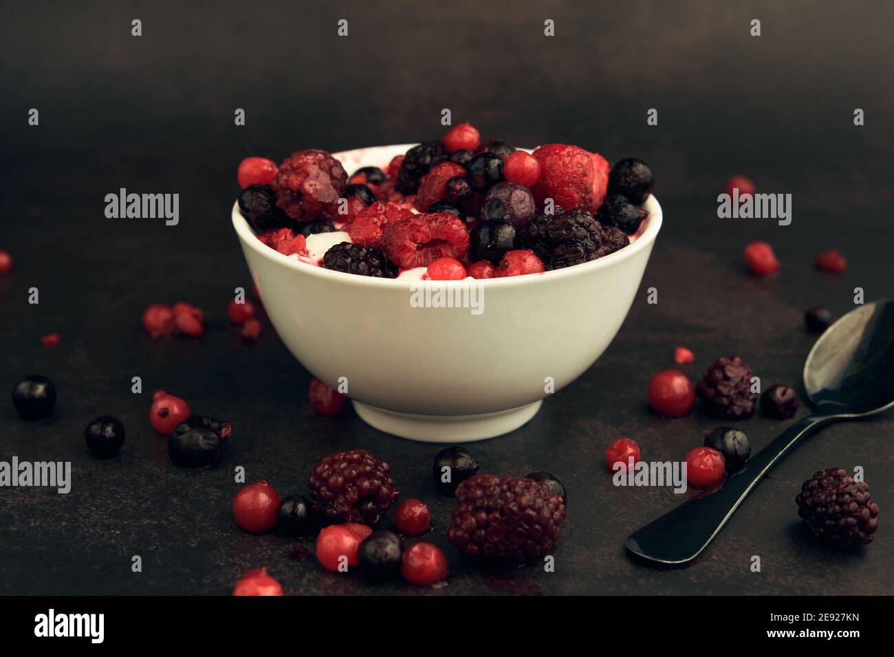 natural yogurt and red berries Stock Photo - Alamy