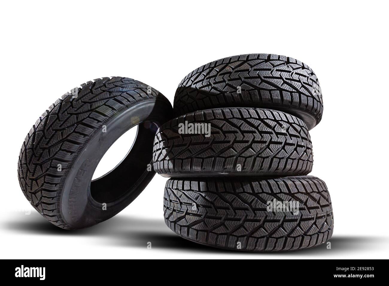 Four tires on the white background Stock Photo - Alamy