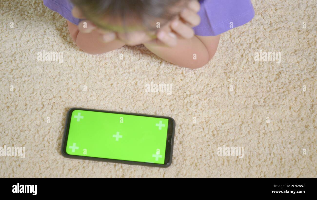 Asian kid boy preschool with gadget playing video games digital on ...