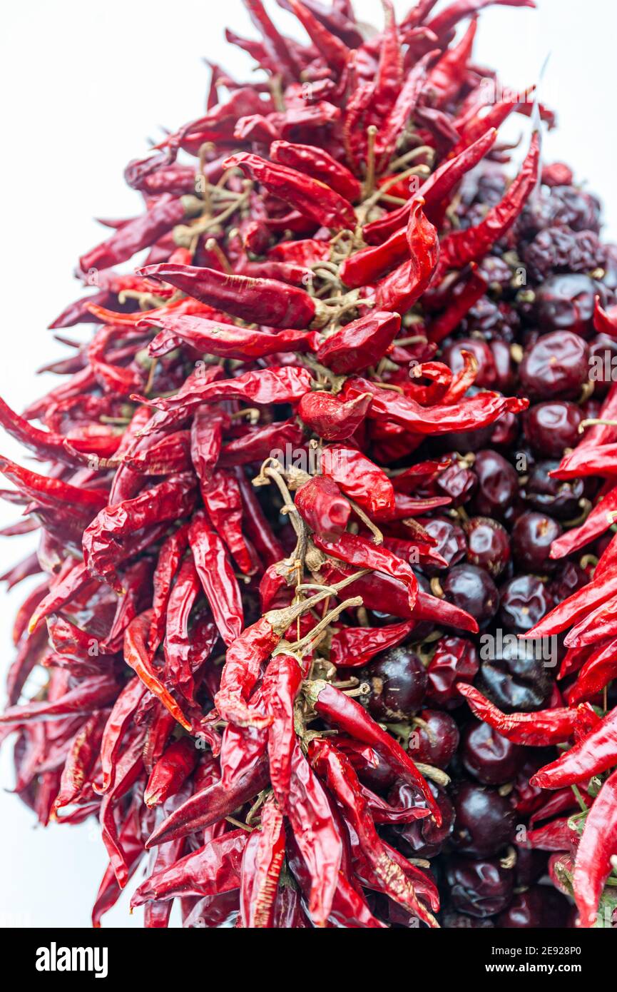 Dried red chili paprika hang in bunch . Food, organic Stock Photo - Alamy